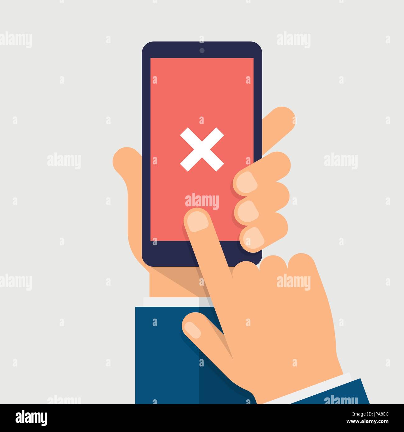 Cross mark on smart-phone screen. Hand holding smart phone. Finger on ...