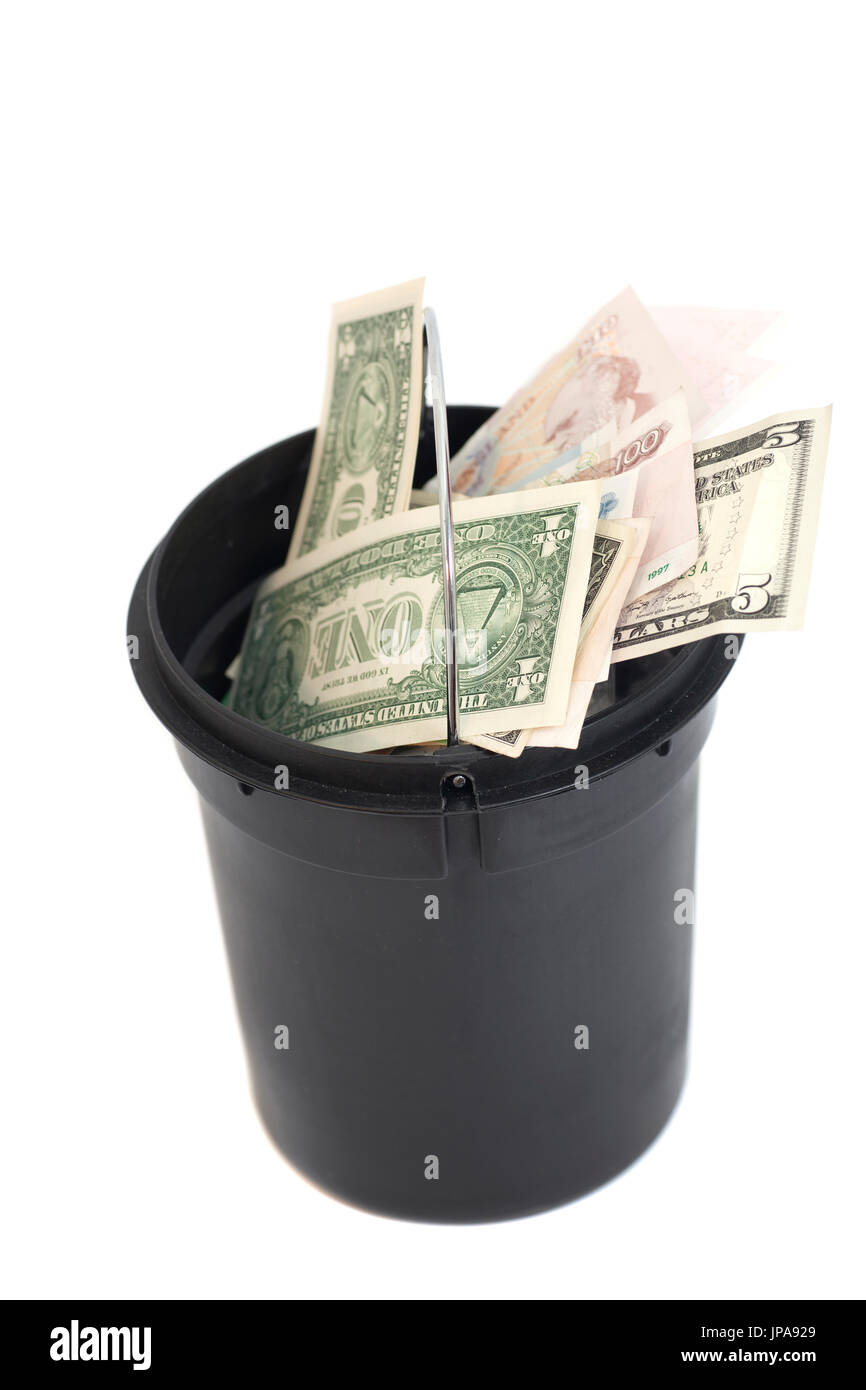 bucket with money over white background Stock Photo - Alamy