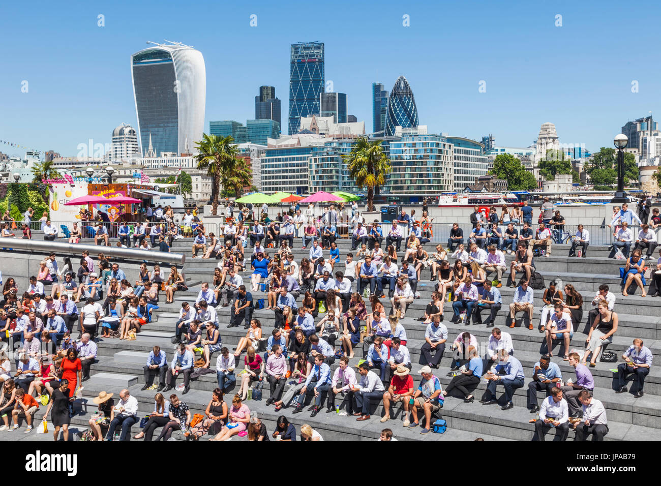 England, London, Southwark, Crowds in The Scoop Amphitheatre and City ...