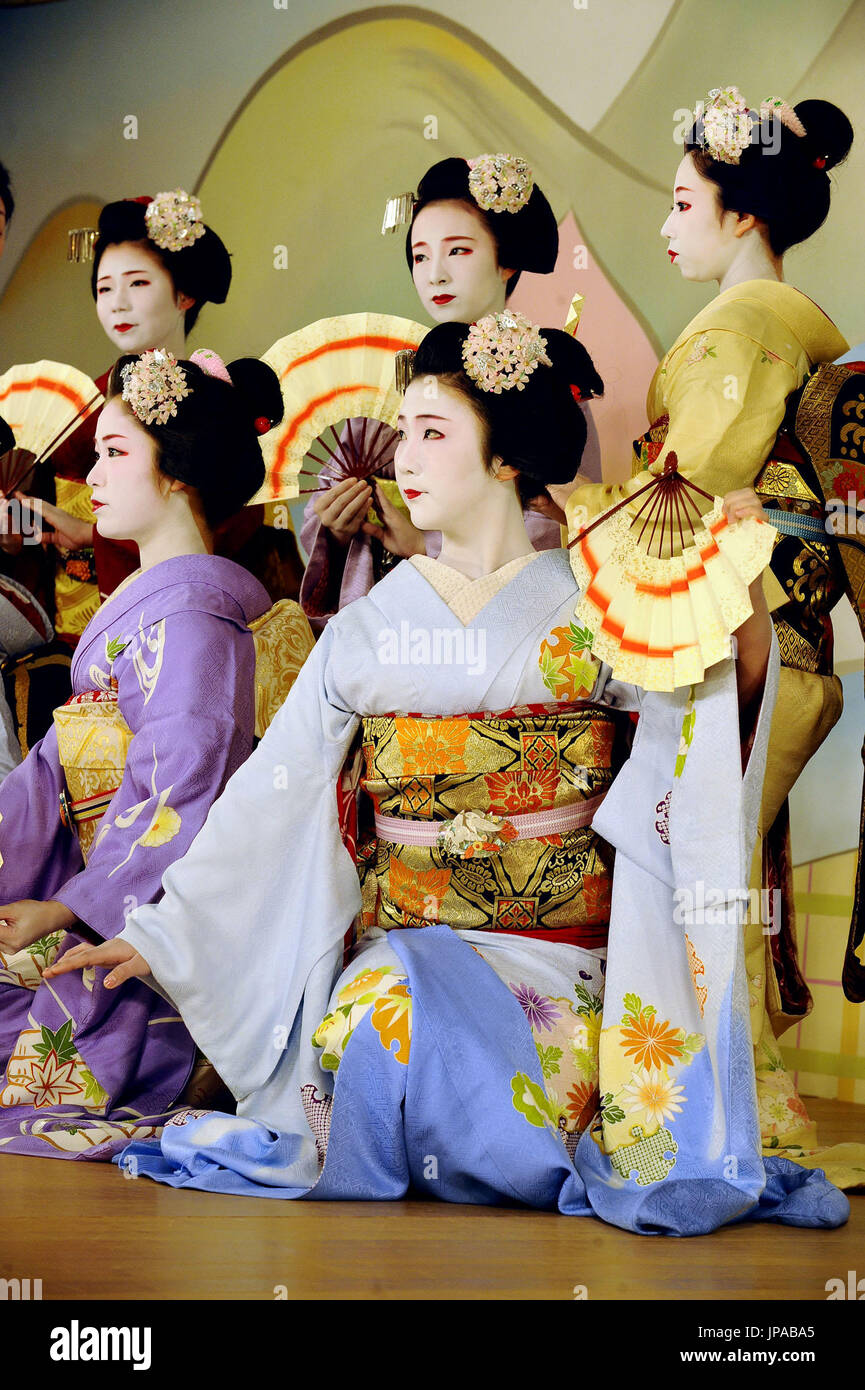 Geisha pose for photos on Feb. 17, 2016, in Kyoto during a kimono ...