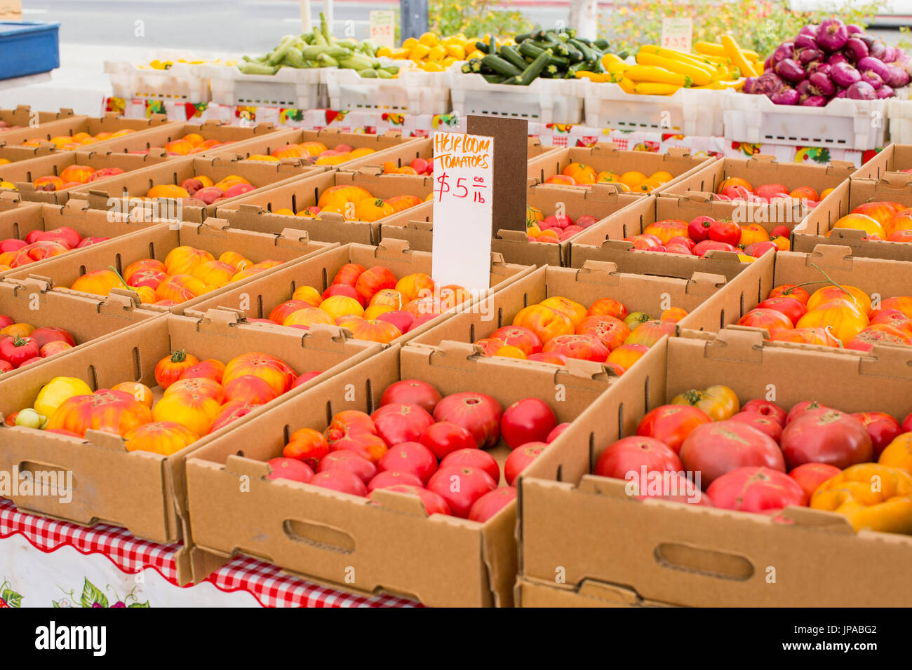 Different varieties of vine-ripened, local heirloom tomatoes and other ...