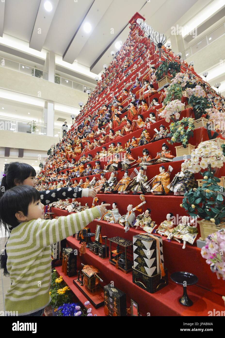 A seven-meter tall pyramid festooned with hina dolls, Japanese ...