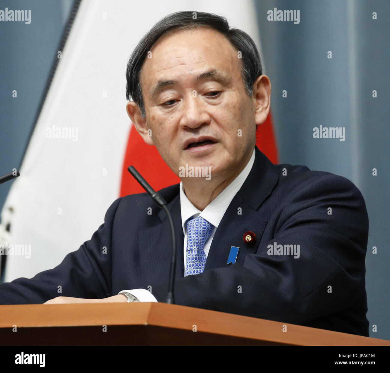 Japanese Chief Cabinet Secretary Yoshihide Suga announces in Tokyo on ...
