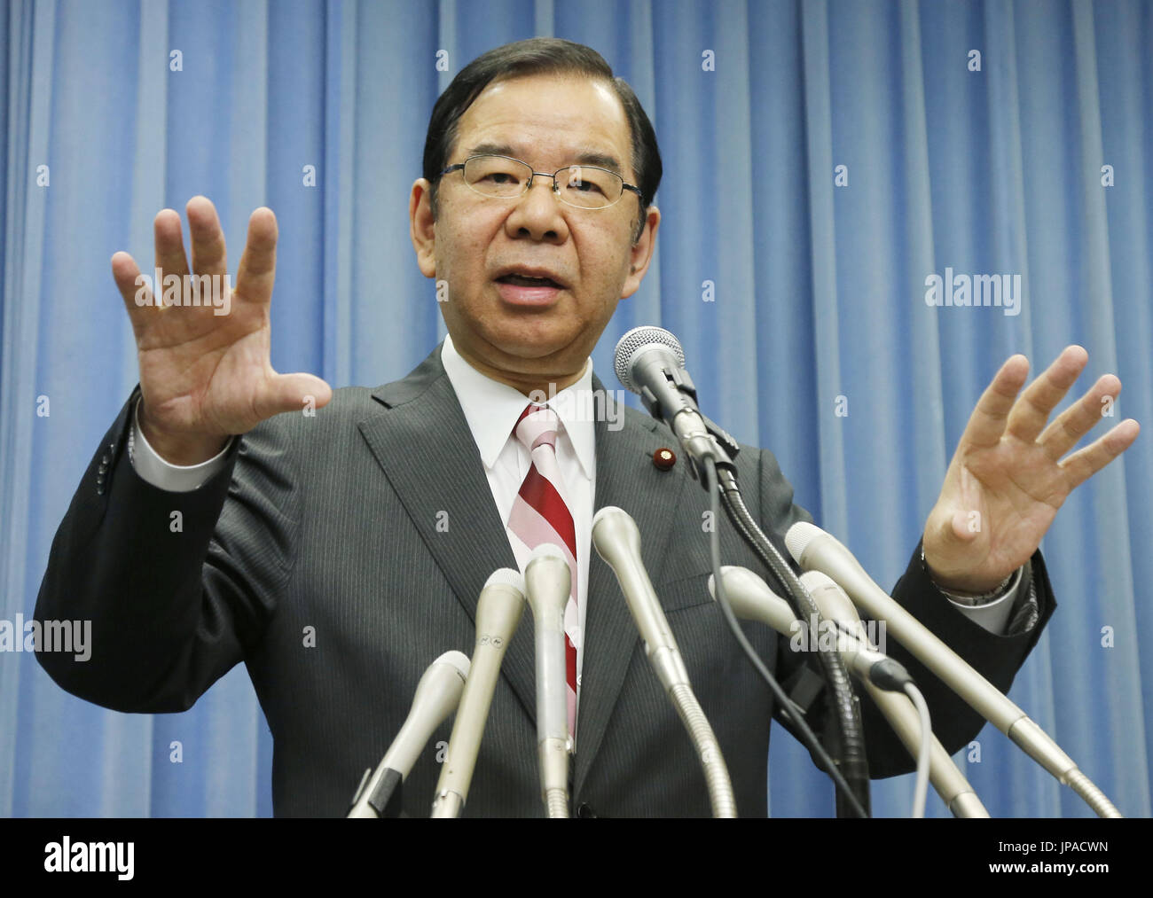 Japanese Communist Party leader Kazuo Shii announces at a press ...