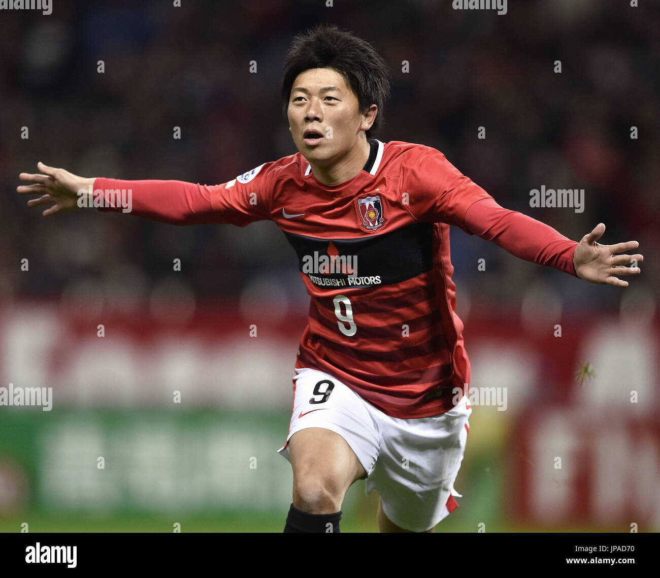 Yuki Muto of Urawa Reds celebrates after scoring the opening goal ...