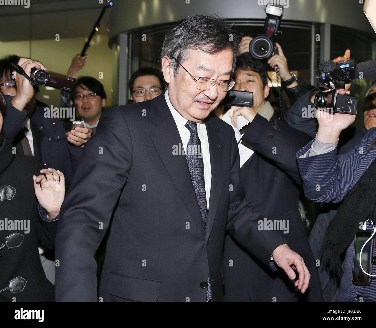 Sharp Corp. President Kozo Takahashi comes out of the company's Tokyo ...