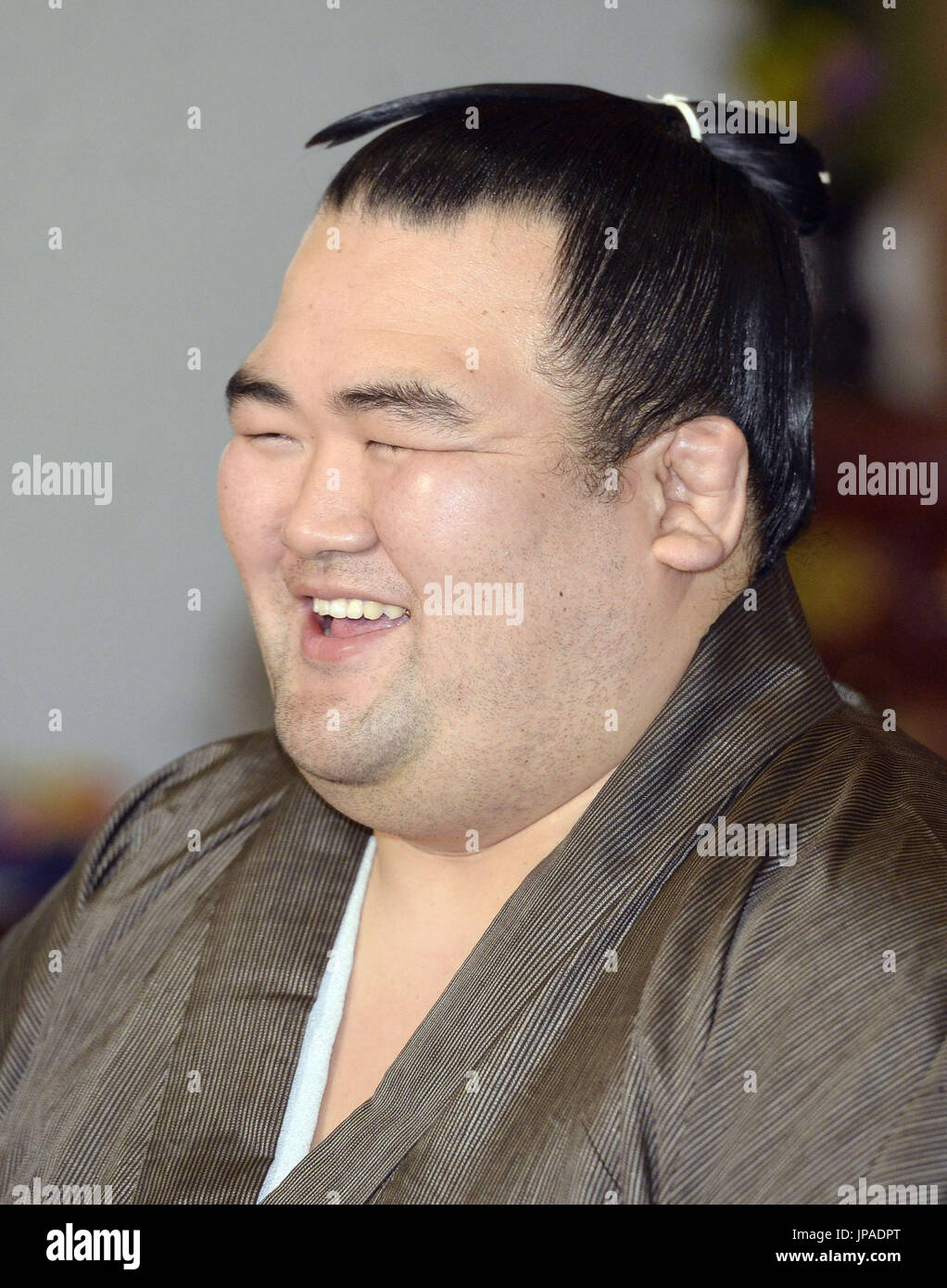 Japanese ozeki Kotoshogiku attends a press conference at his Sadogatake ...