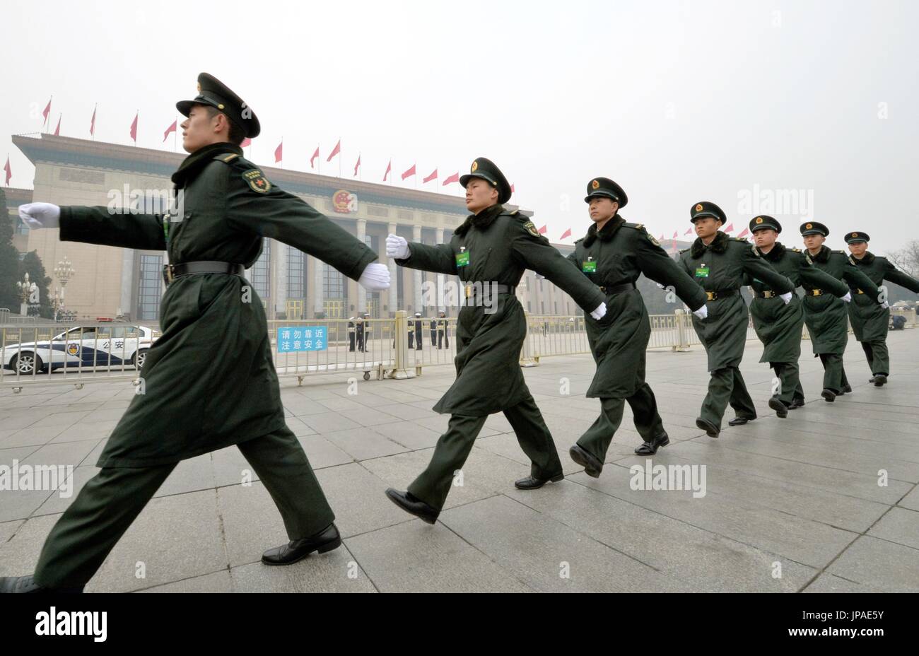Soldiers of China's People's Liberation Army march in line in front of ...