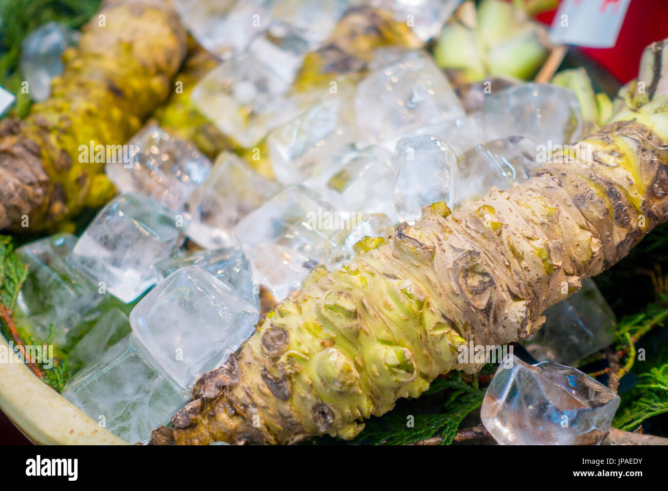 OSAKA, JAPAN - JULY 18, 2017: Fresh wasabi root are sold along the ...