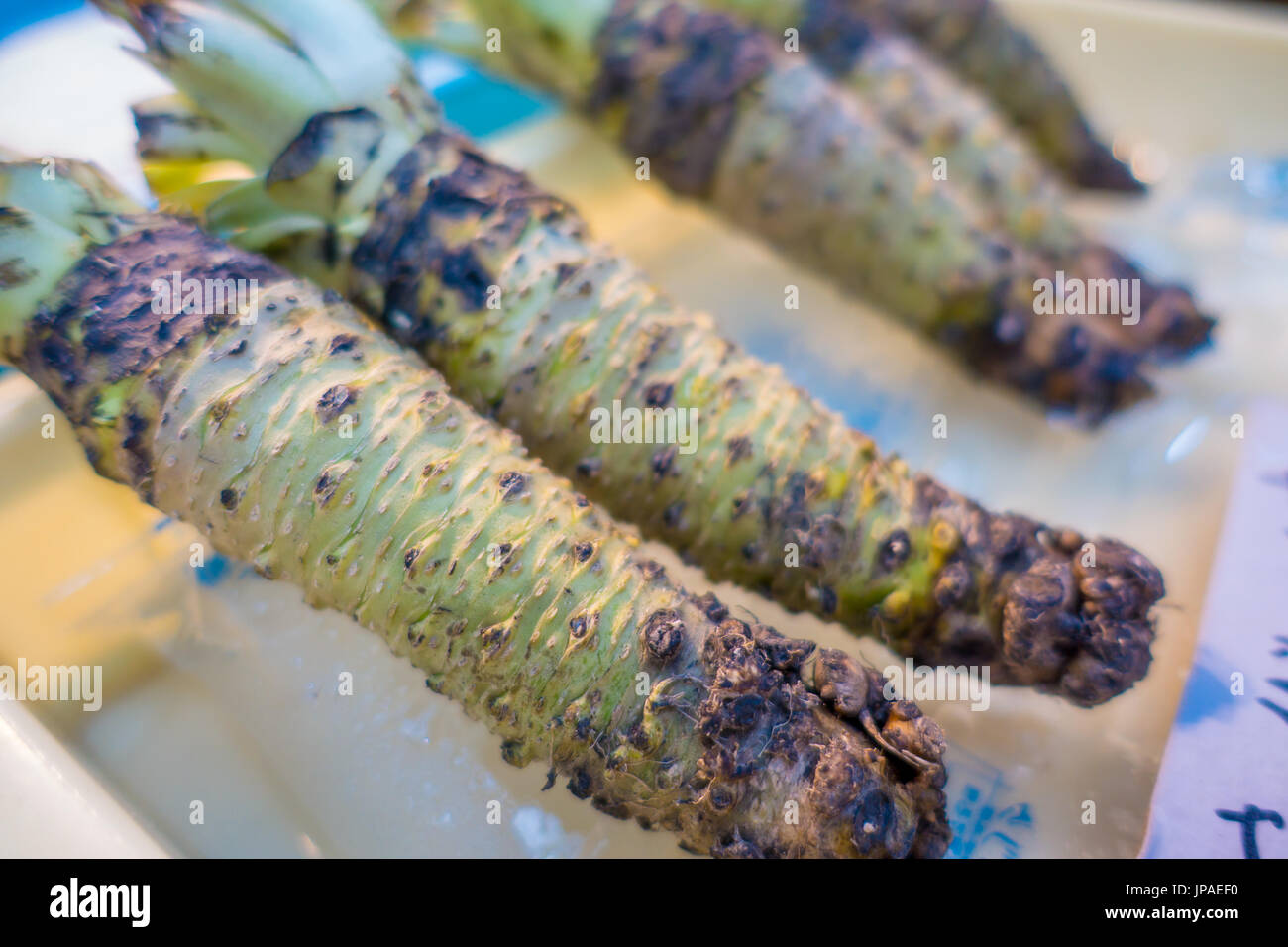 OSAKA, JAPAN - JULY 18, 2017: Close up of fresh wasabi root are sold ...