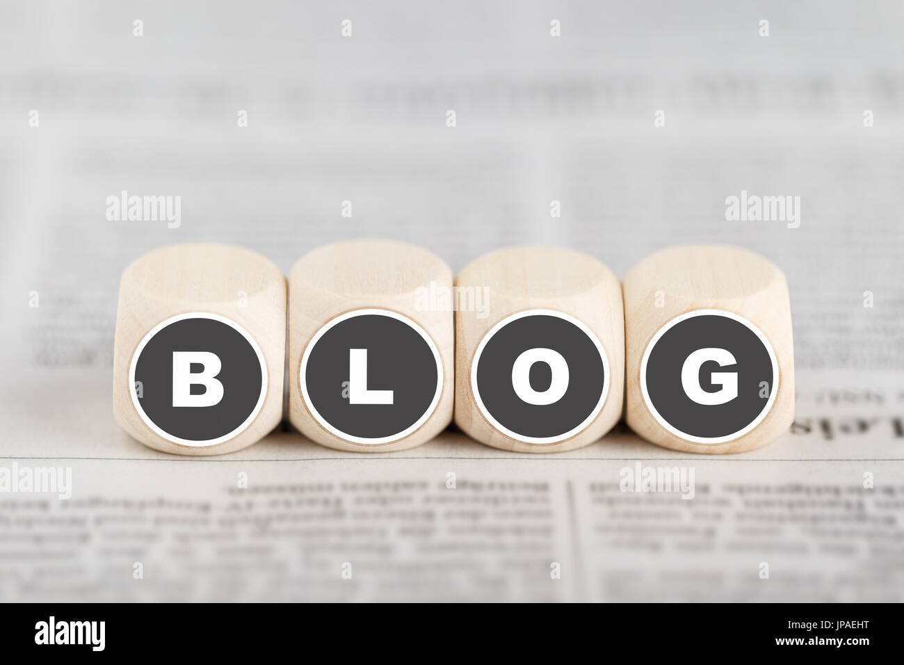 The words blog on cubes on a newspaper Stock Photo - Alamy
