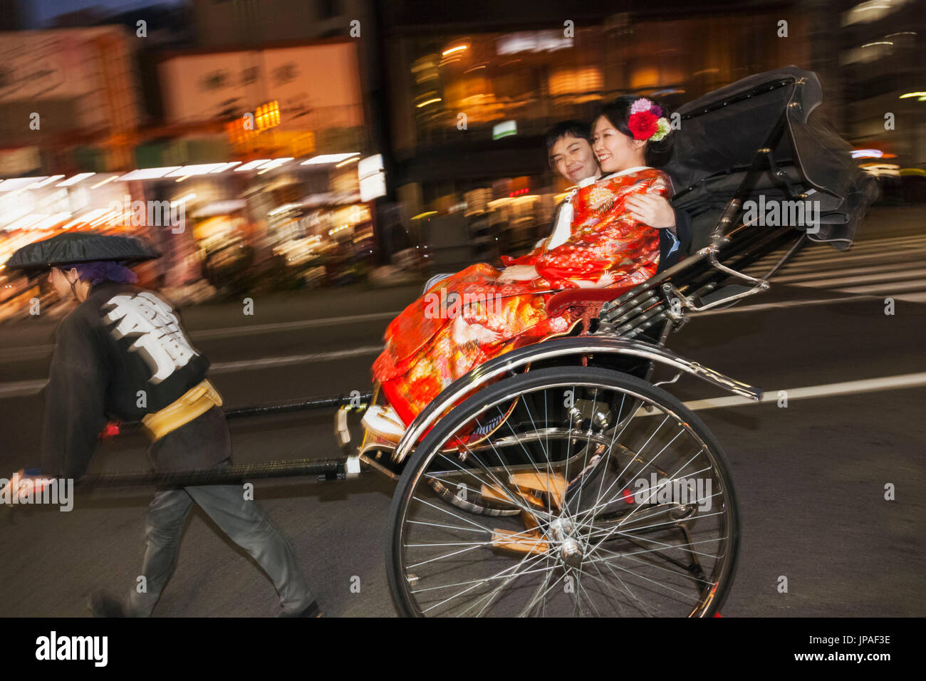 Japan, Honshu, Tokyo, Asakusa, Couple in Rickshaw Stock Photo - Alamy