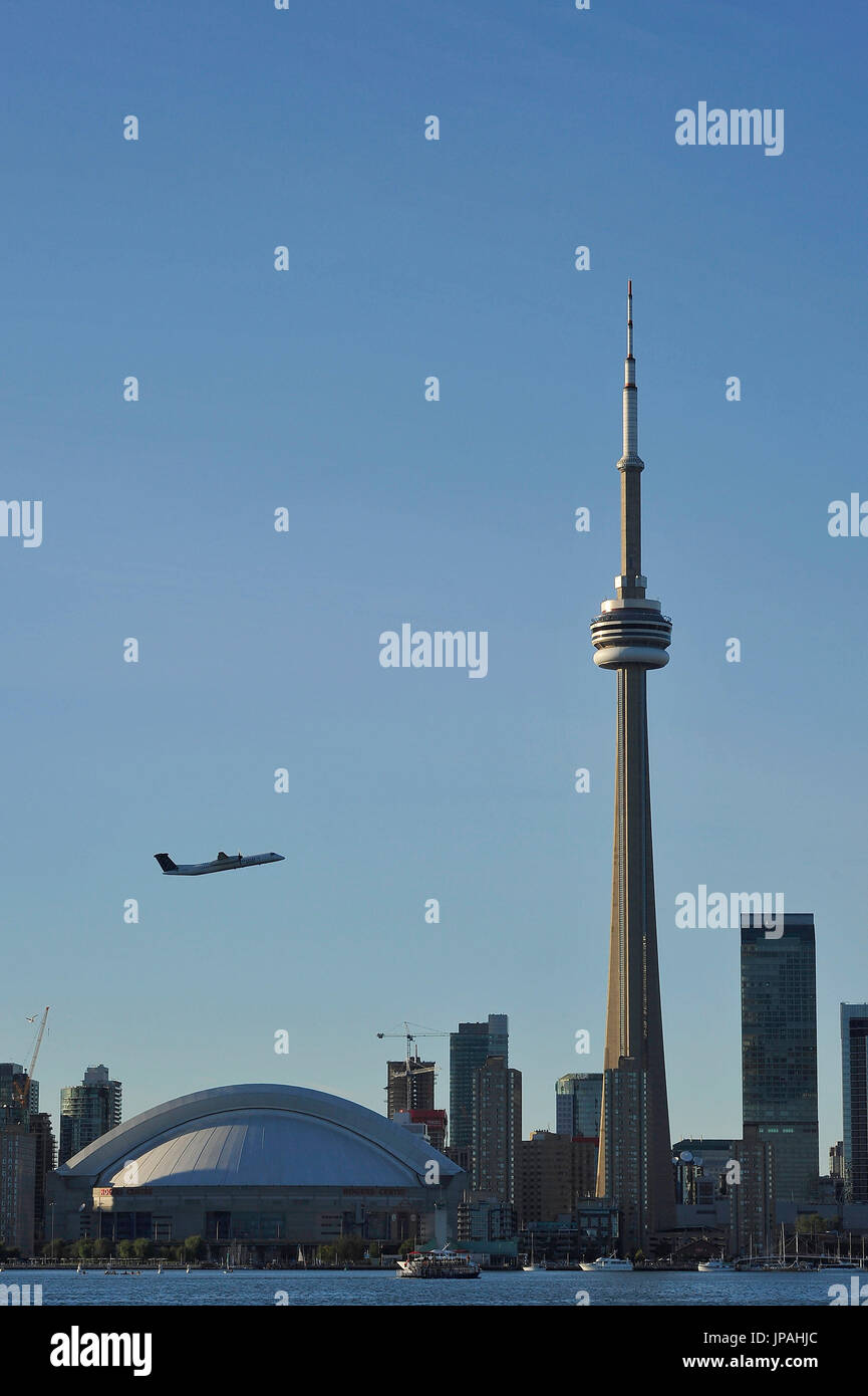CN Tower and starting airplane in Toronto Stock Photo - Alamy