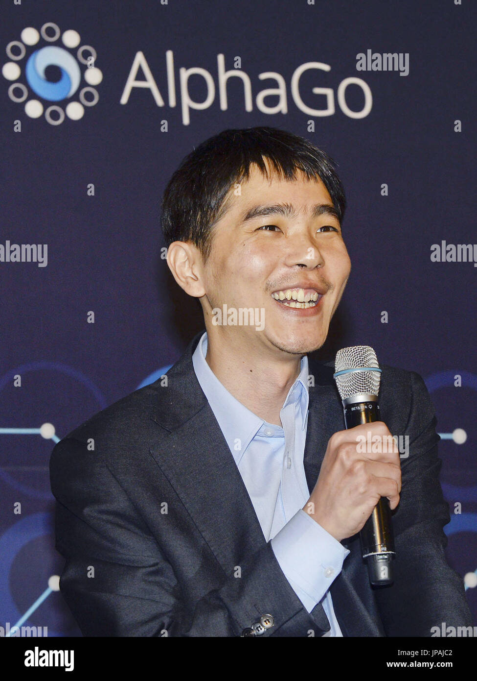 South Korea's Lee Sedol, the world's top go player, smiles during a ...