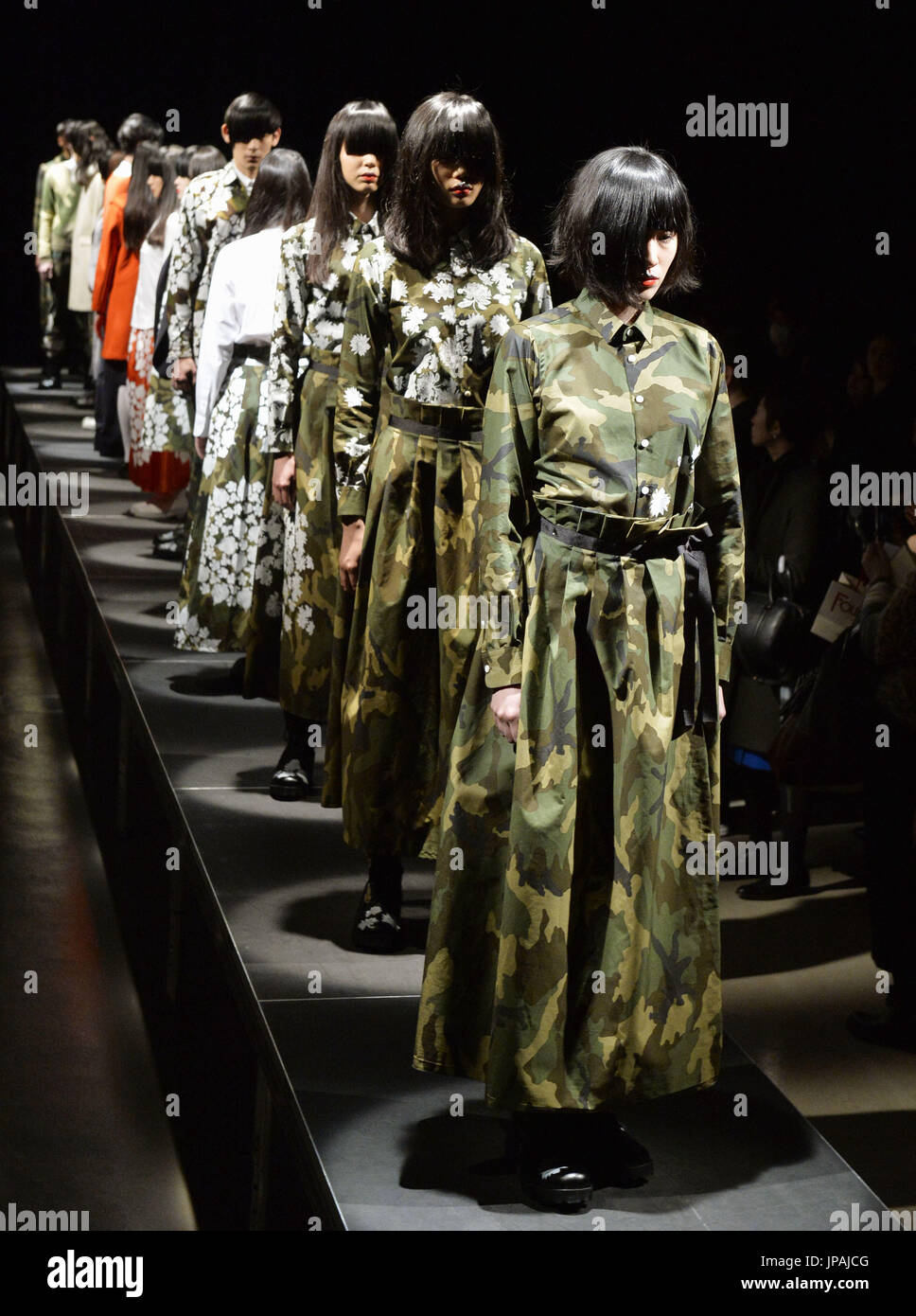 Models wearing outfits of Japanese brand "TSUKASA MIKAMI" walk on a ...