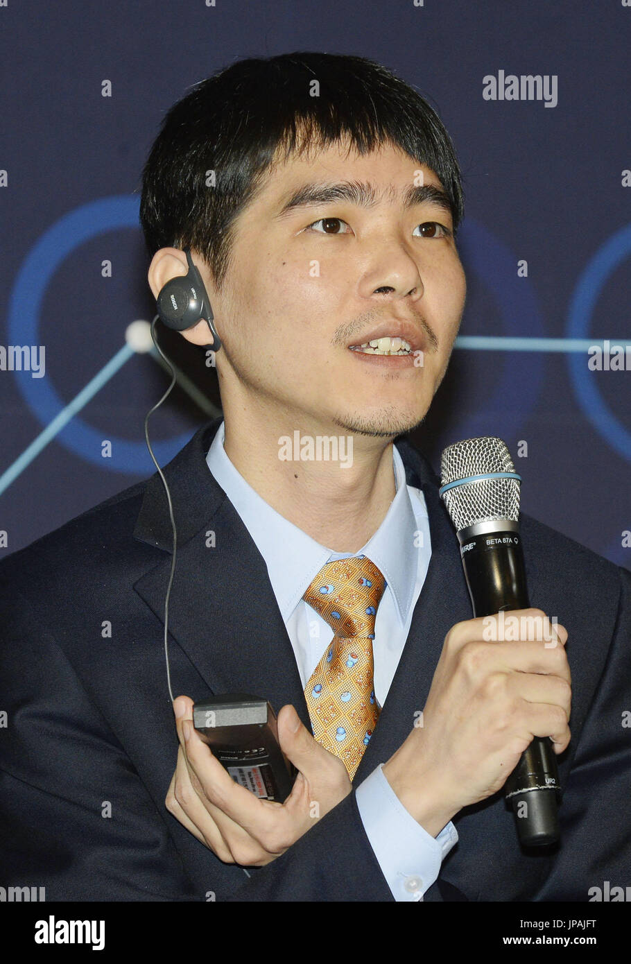 South Korean Go grandmaster Lee Se Dol attends a press conference on ...