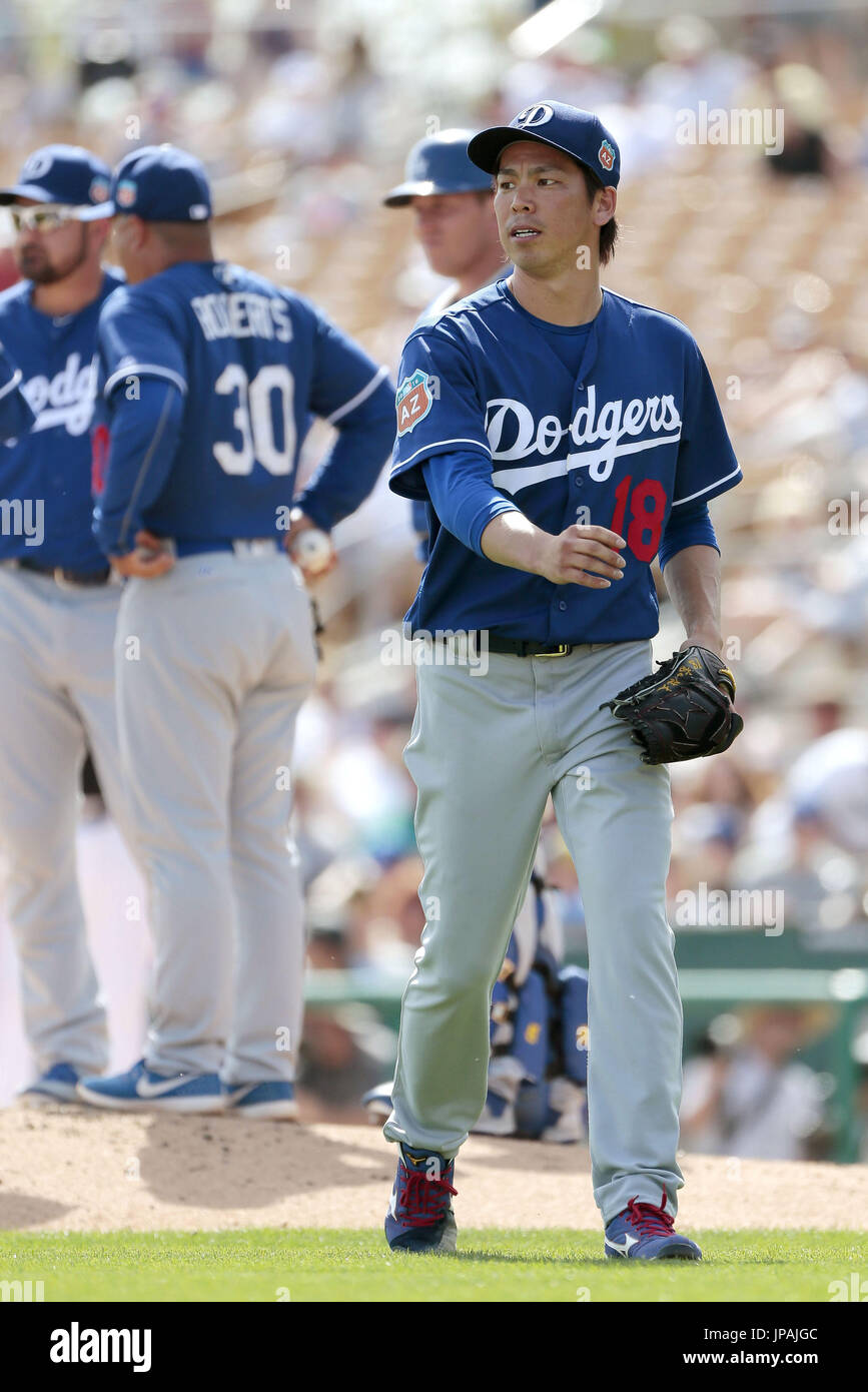 Los Angeles Dodgers pitcher Kenta Maeda walks back to the dugout after ...