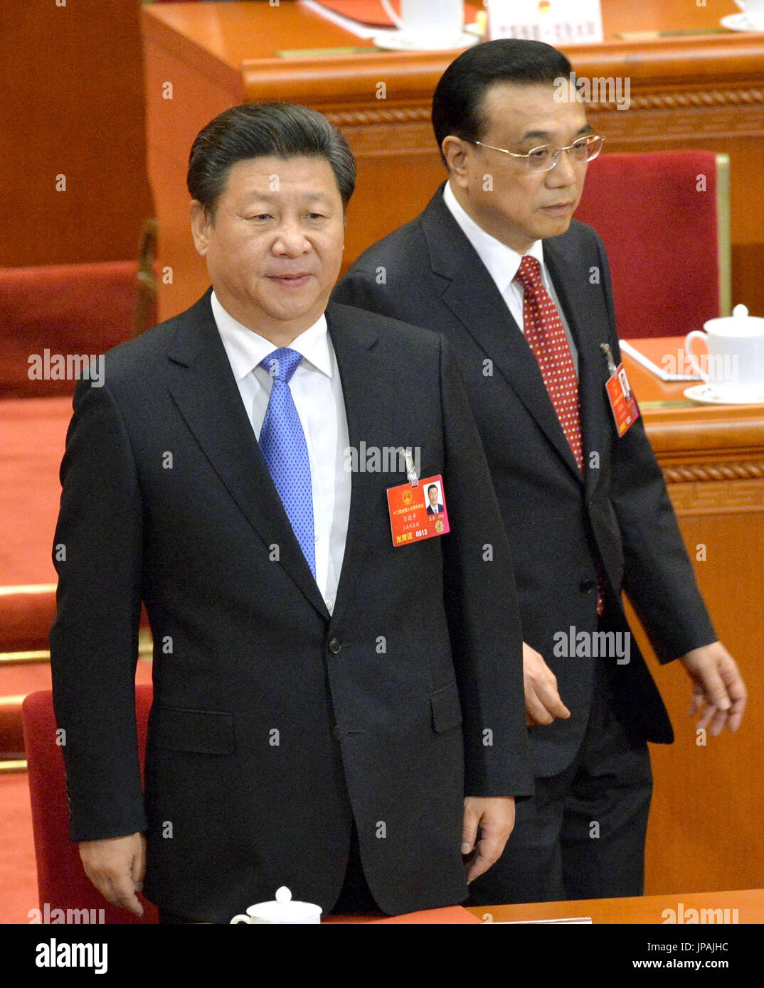 Chinese President Xi Jinping (L) and Premier Li Keqiang attend the ...