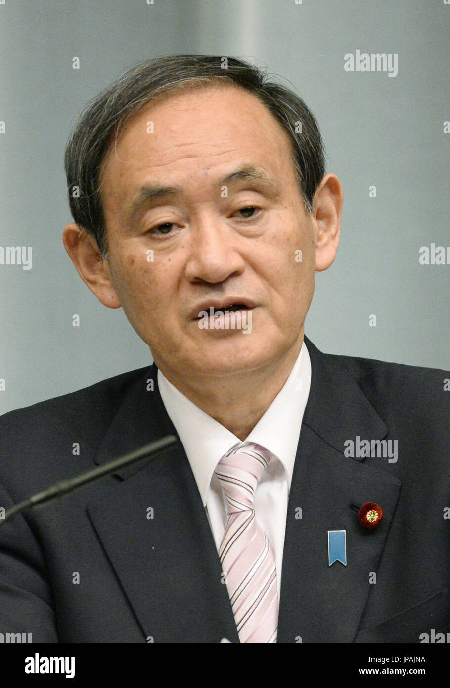 Chief Cabinet Secretary Yoshihide Suga speaks during a press conference ...