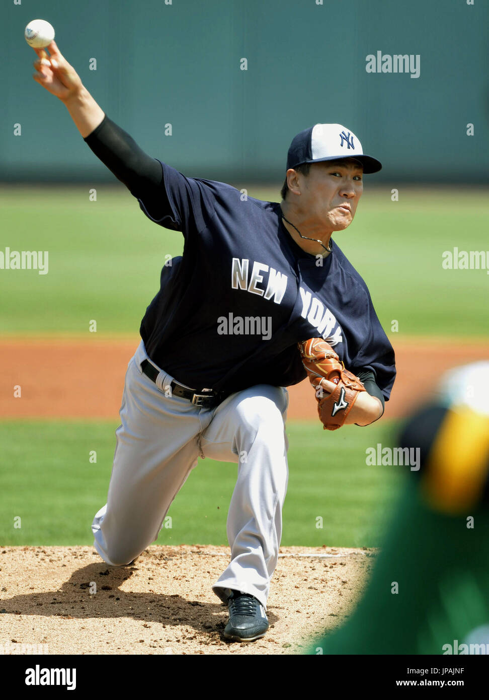 New York Yankees pitcher Masahiro Tanaka starts a spring training game ...