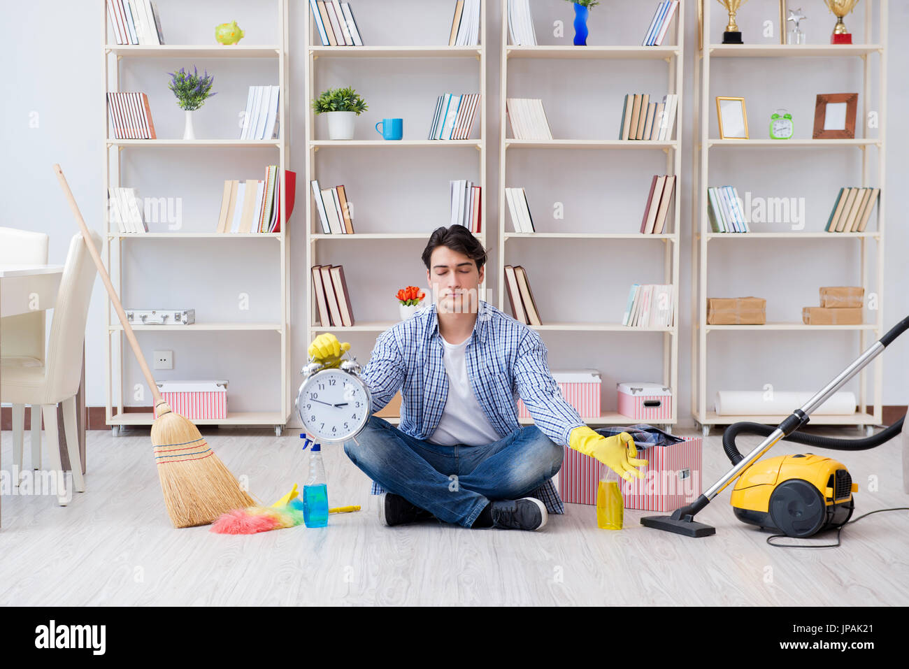 Man doing cleaning at home Stock Photo - Alamy