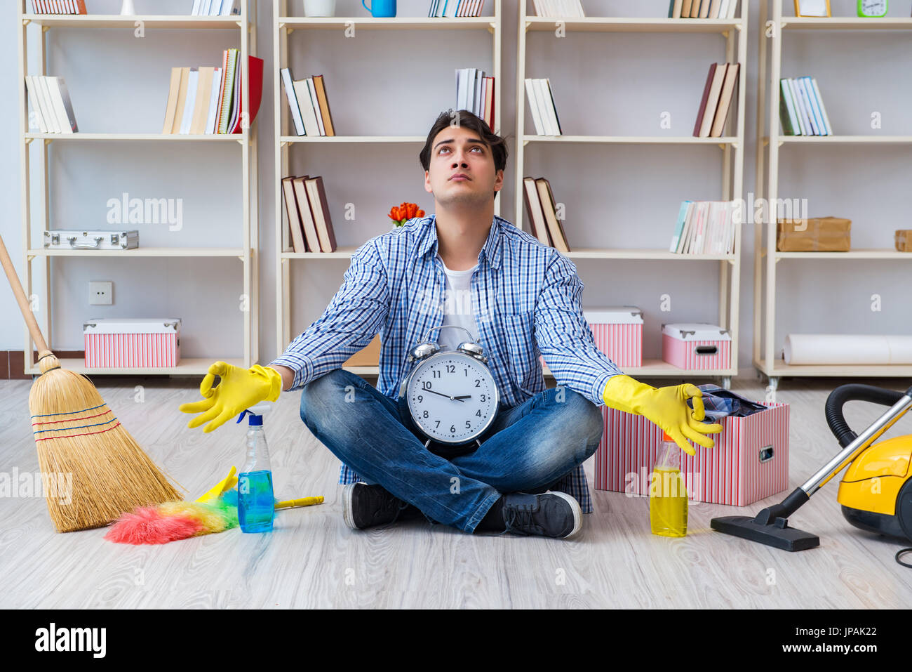 Man cleaning clock hi-res stock photography and images - Alamy