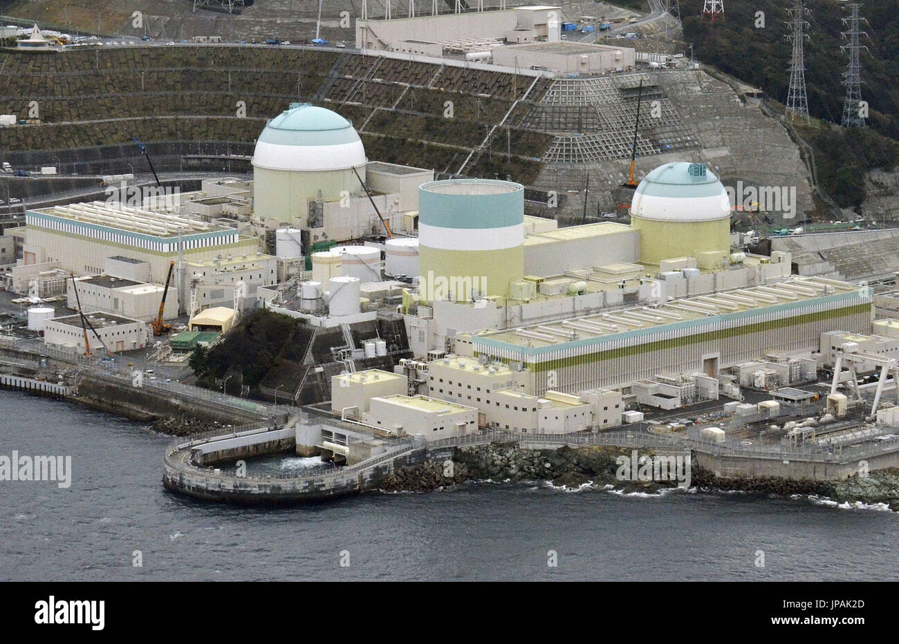 File photo taken in November 2015 shows the No. 3 reactor (L) of ...