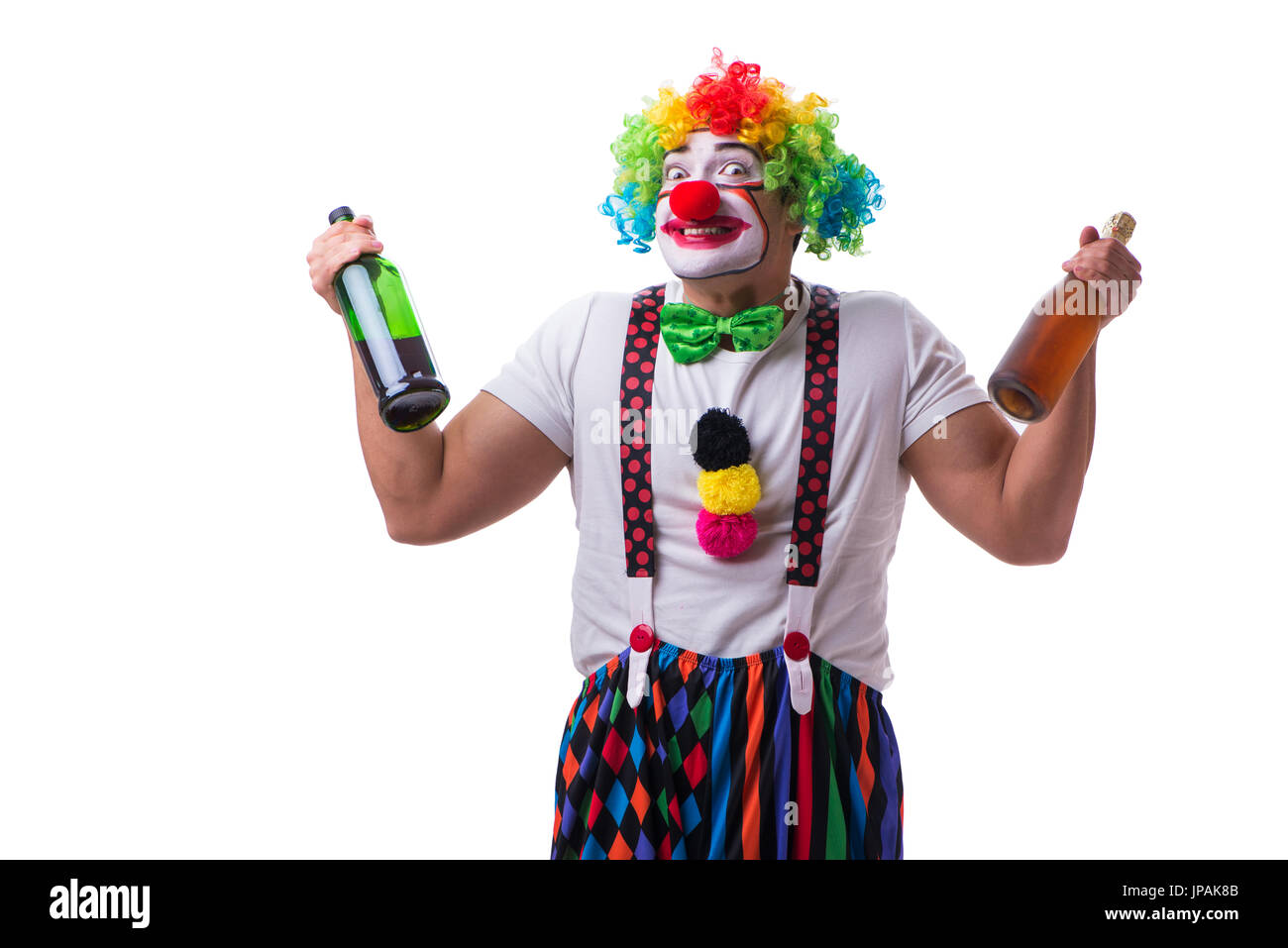 Funny clown with a bottle isolated on white background Stock Photo - Alamy