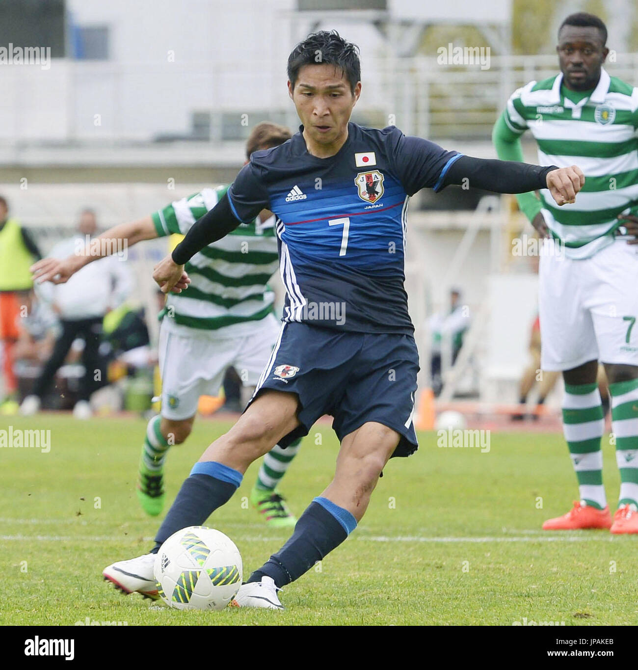 Japan U-23 midfielder Riki Harakawa (7) scores a penalty during the ...
