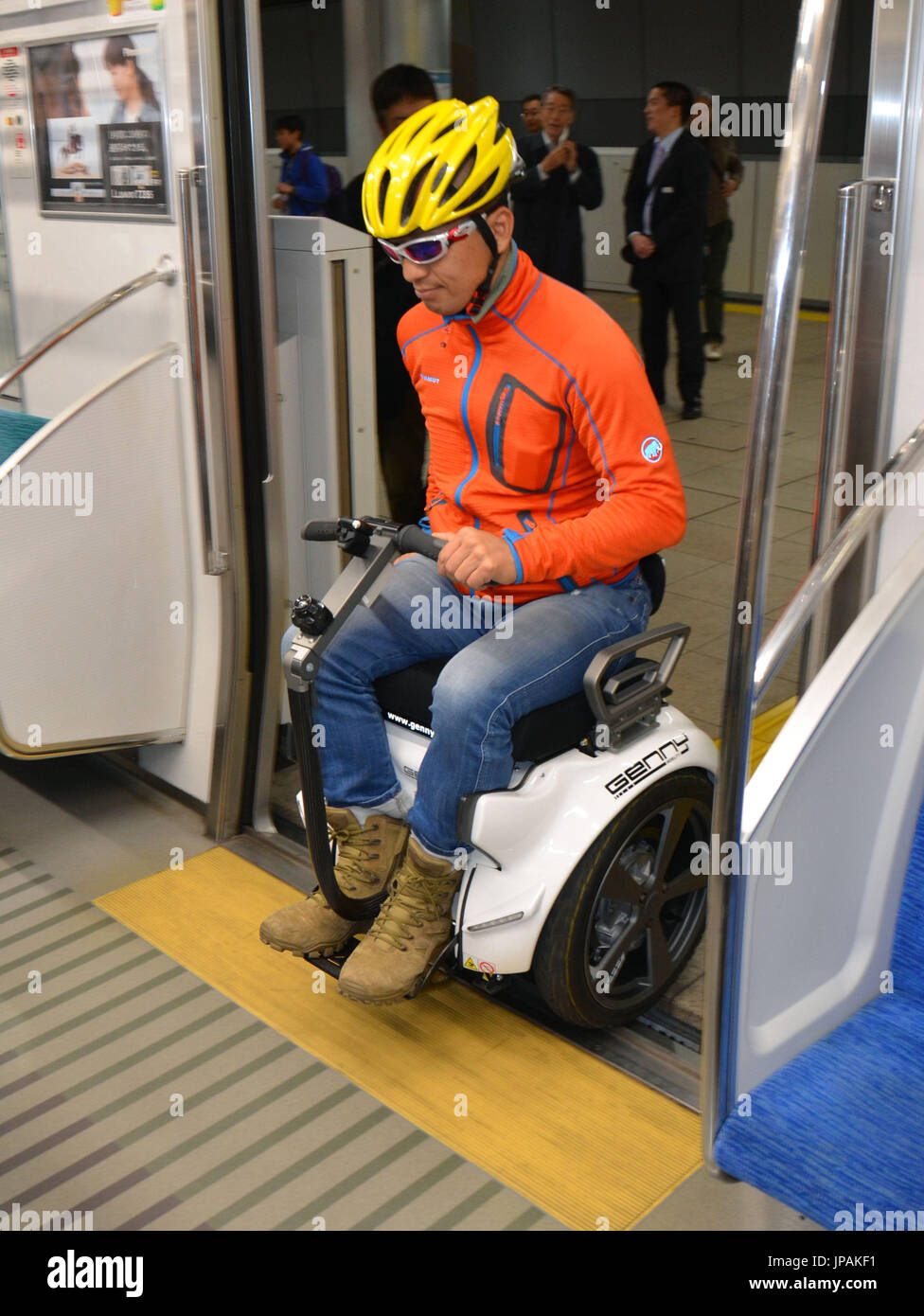 An official at Segway Japan Ltd. operates its Genny motorized ...
