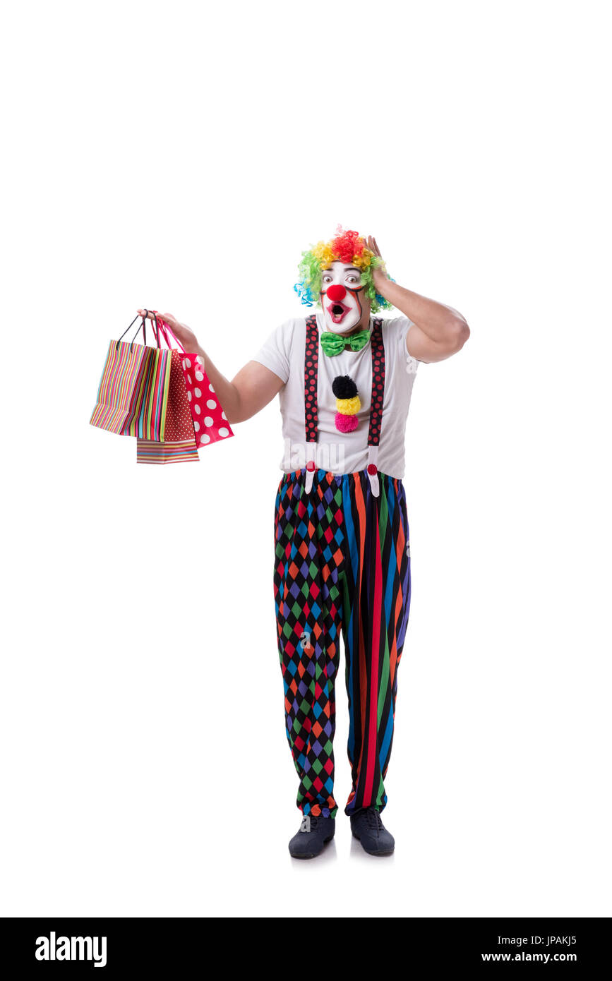 Funny clown with shopping bags isolated on white background Stock Photo ...