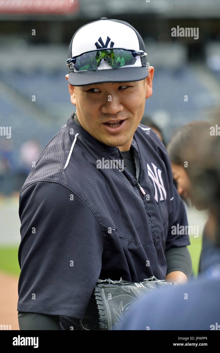 New York Yankees pitcher Masahiro Tanaka smiles following an interview with reporters in New ...