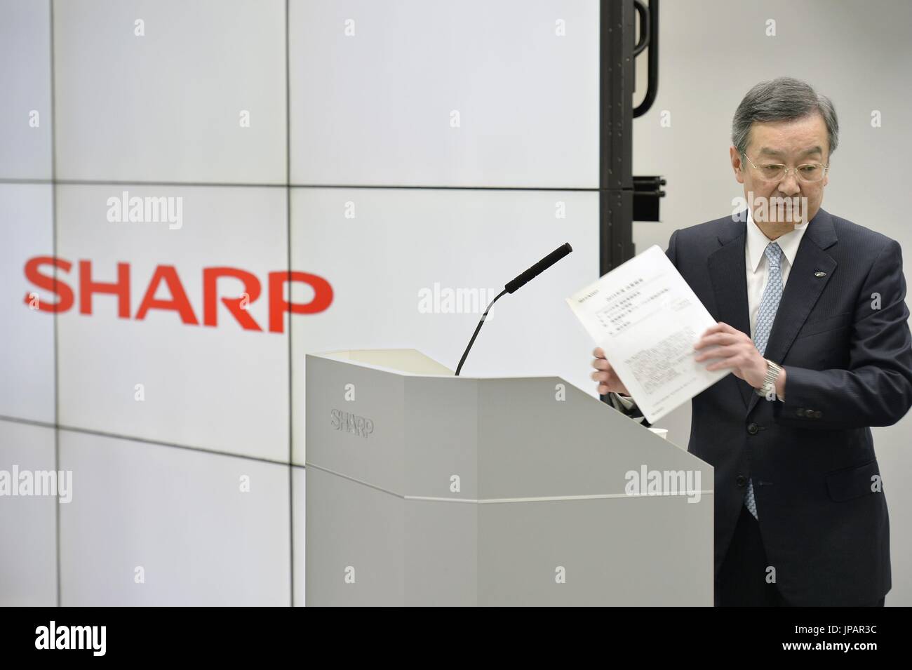 Kozo Takahashi, president of Sharp Corp., gets ready to announce the ...