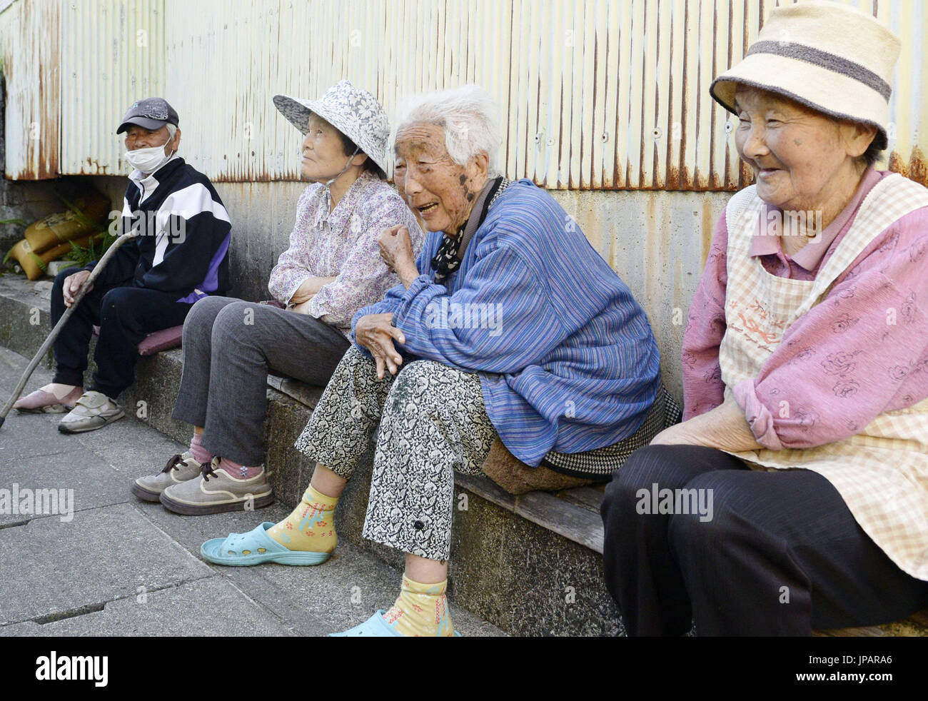 Elderly people, who live in the western Japan town of Daiochofunakoshi ...