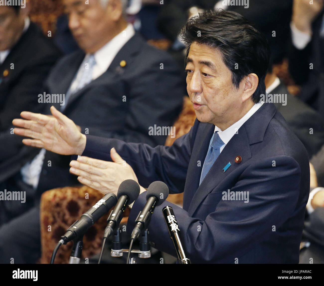 Prime Minister Shinzo Abe attends the Budget Committee of the House of ...