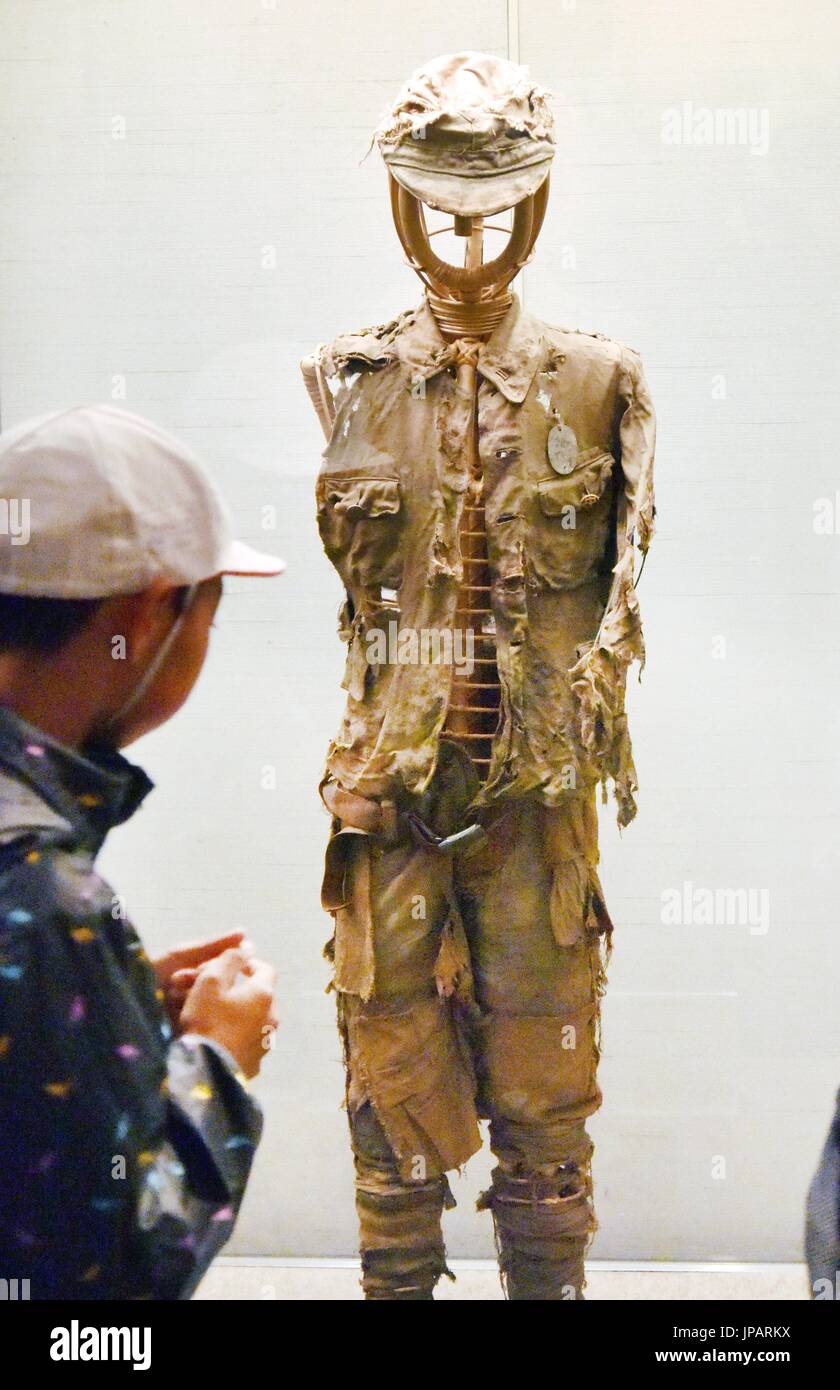 A mannequin wearing a torn school uniform is one of the relics showing ...