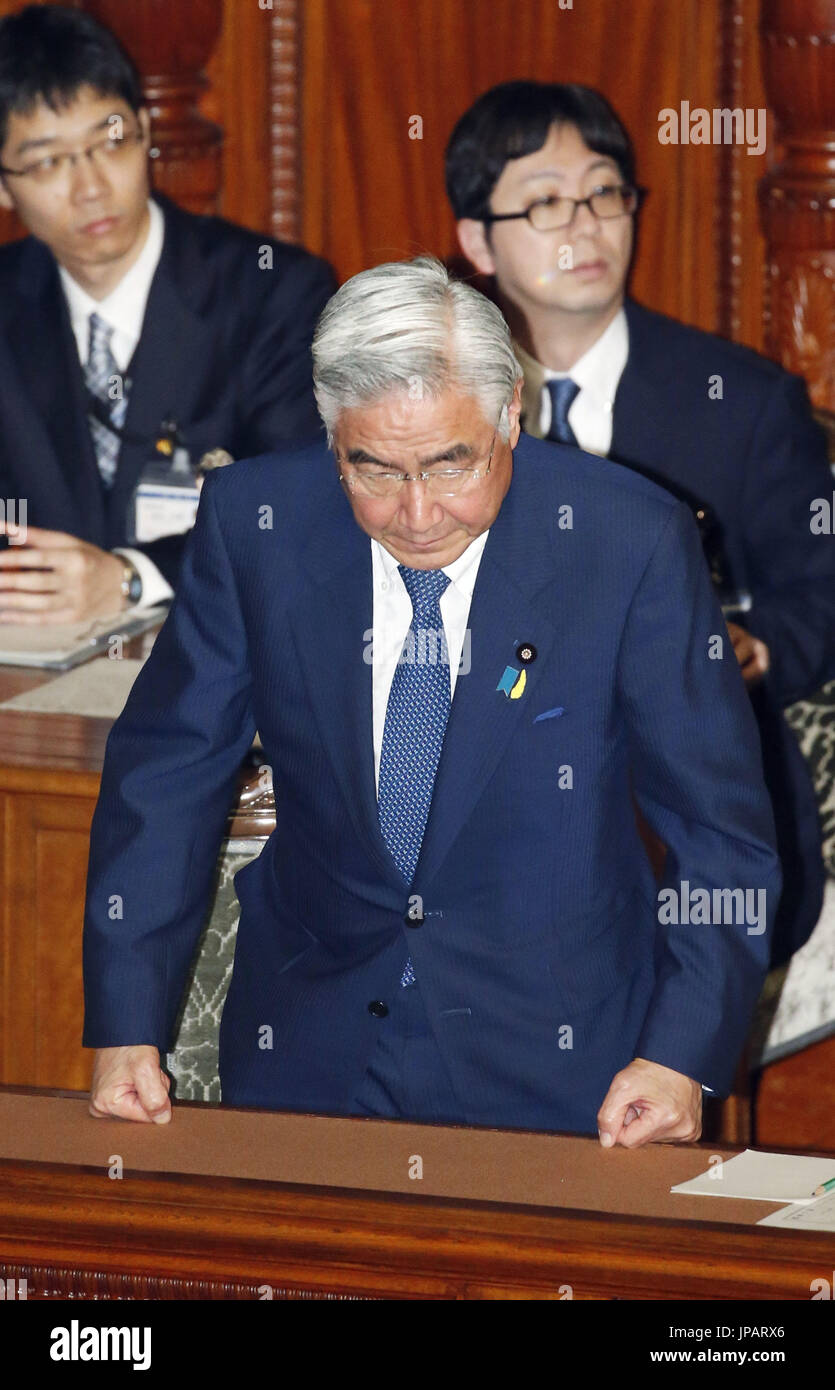 Japanese Justice Minister Mitsuhide Iwaki (front) bows during a plenary ...