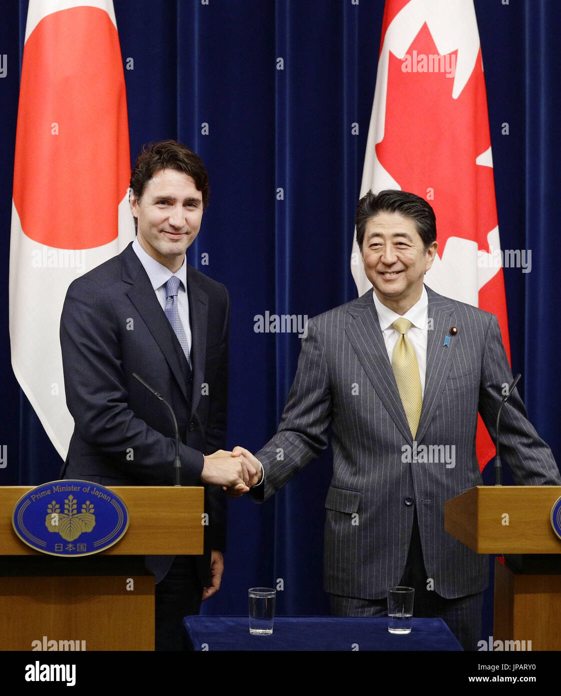 Canadian Prime Minister Justin Trudeau (L) and Japanese Prime Minister ...