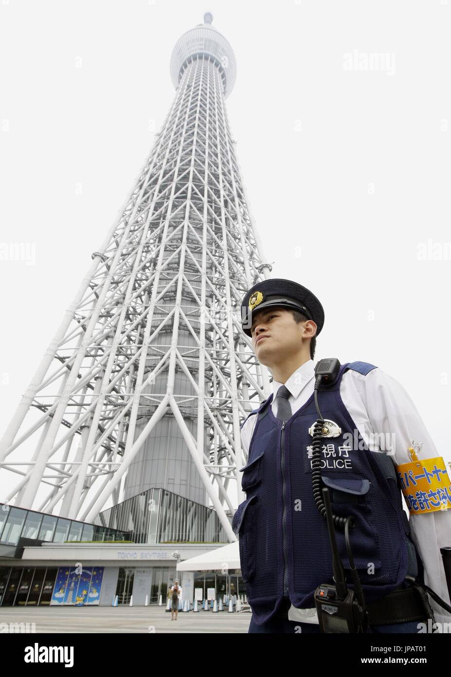 A police officer stands guard in front of the Tokyo Skytree on May 25 ...