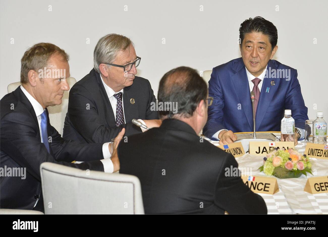 Japanese Prime Minister Shinzo Abe R Alongside European Commission President Jean Claude