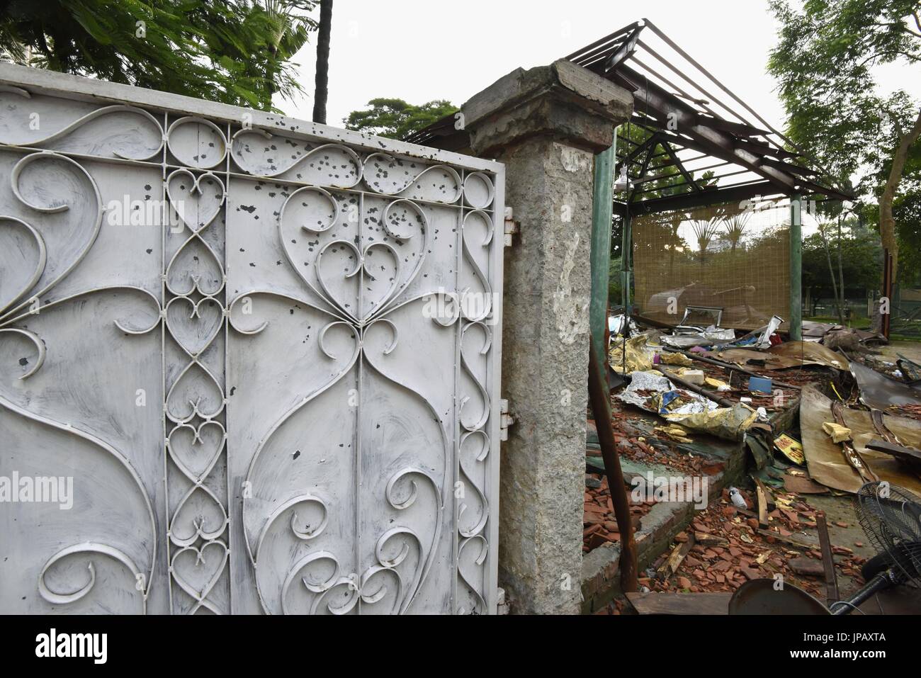 Bullet holes scar the gate of the Holey Artisan Bakery cafe in Dhaka on ...