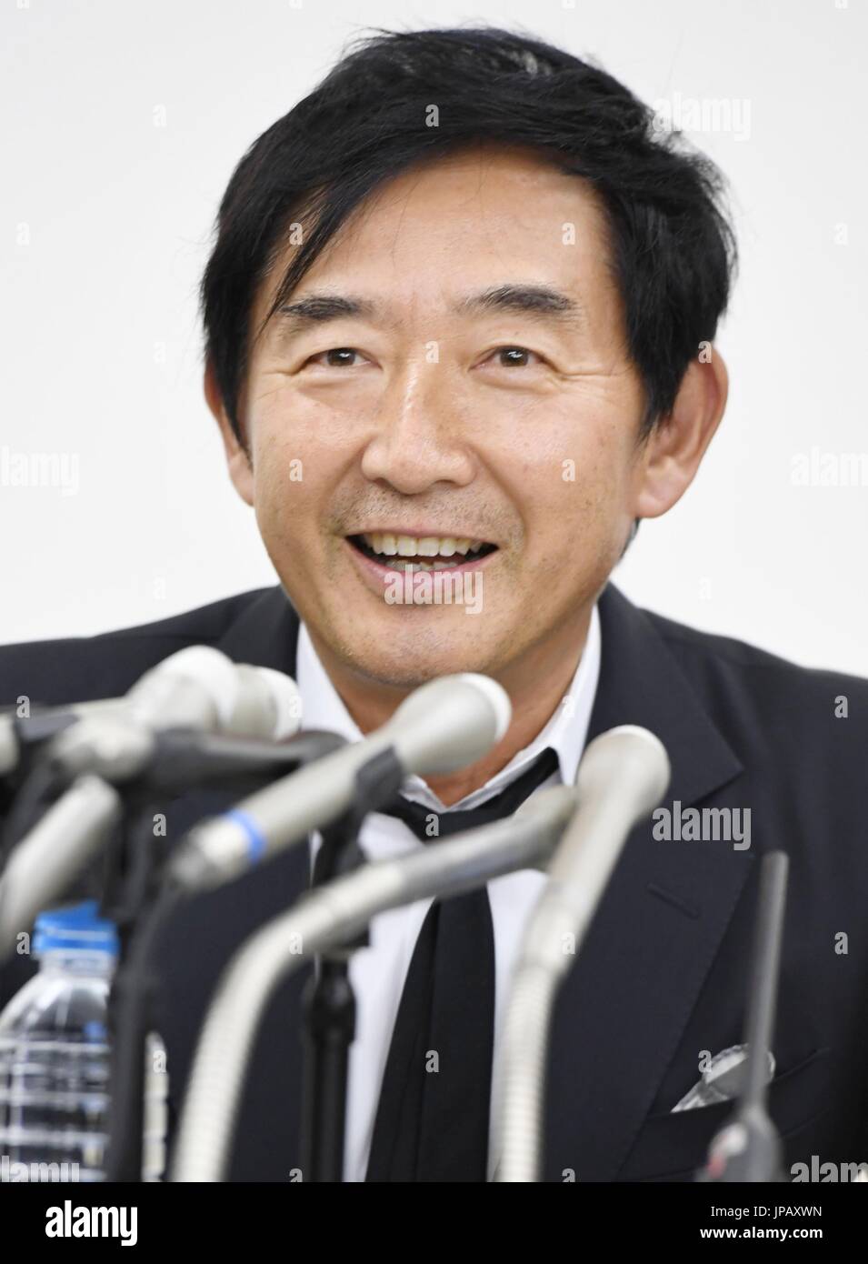 Actor and television personality Junichi Ishida speaks at a press ...