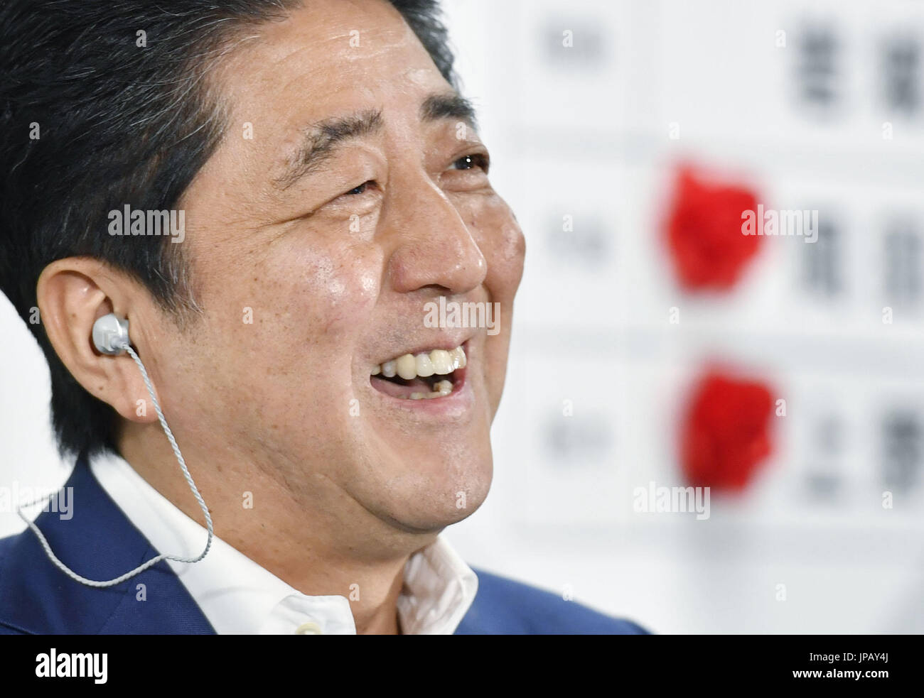 Prime Minister Shinzo Abe smiles while being interviewed at the ...