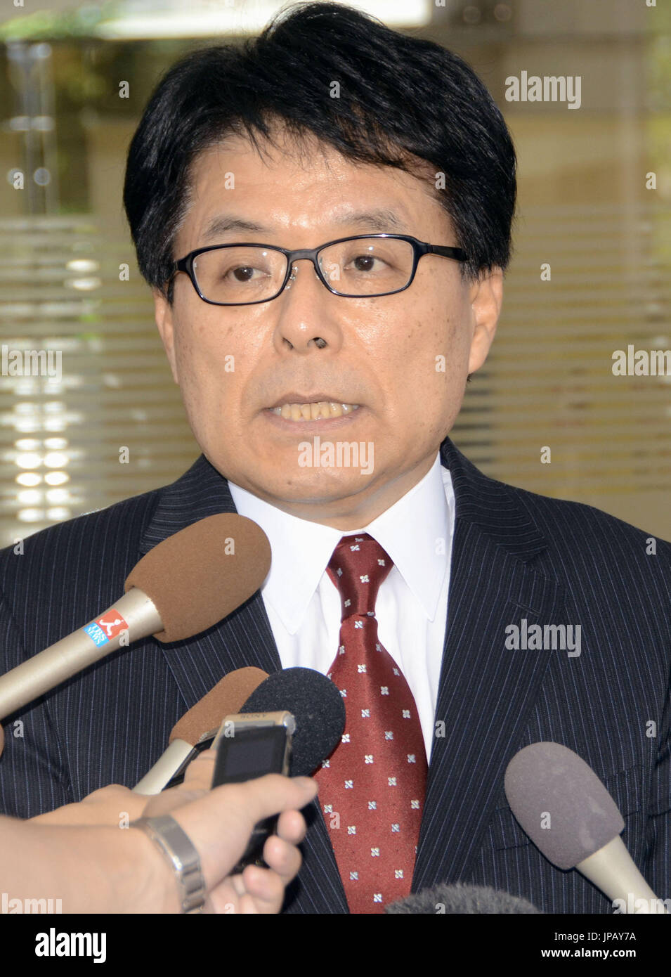 Former internal affairs minister Hiroya Masuda meets with reporters in ...