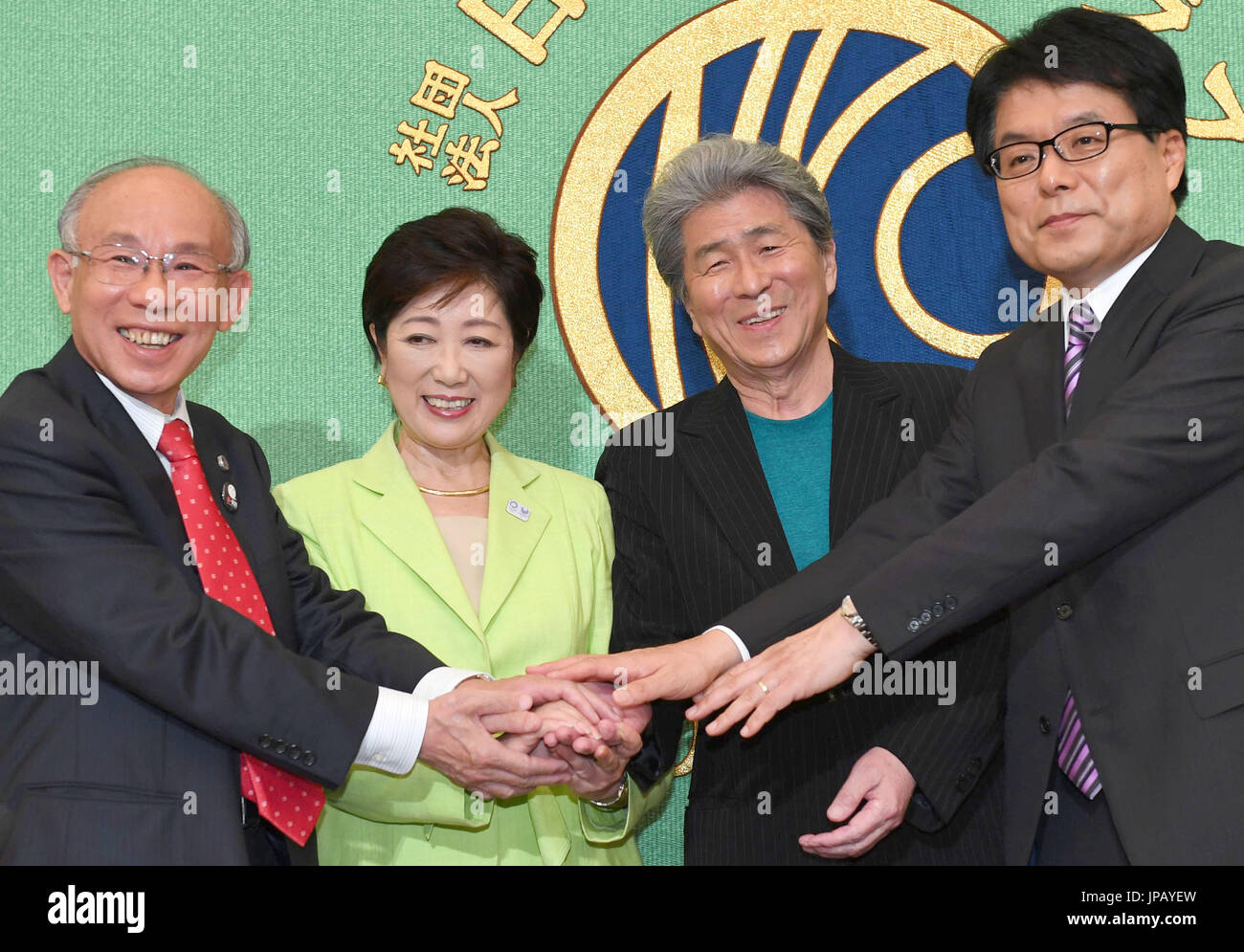 Four likely candidates for Tokyo governor put their hands together ...