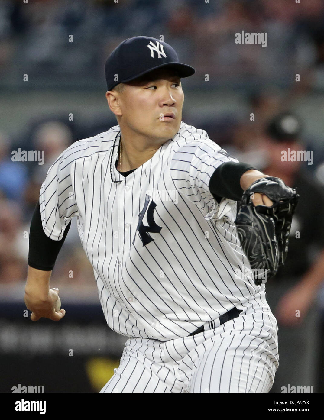 New York Yankees pitcher Masahiro Tanaka starts in a game against the Boston Red Sox in New York ...