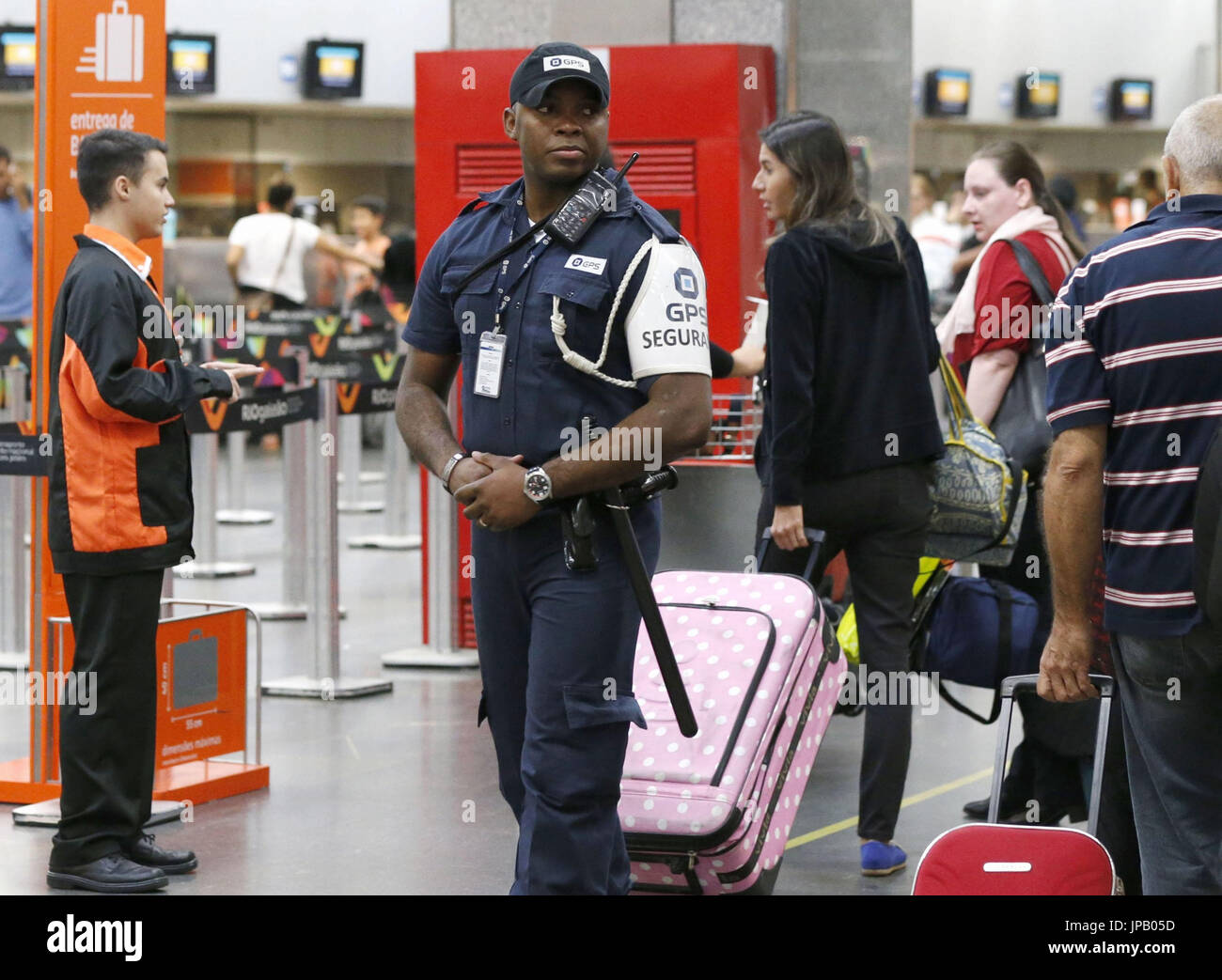 A security guard patrols Rio de Janeiro's Galeao International Airport ...