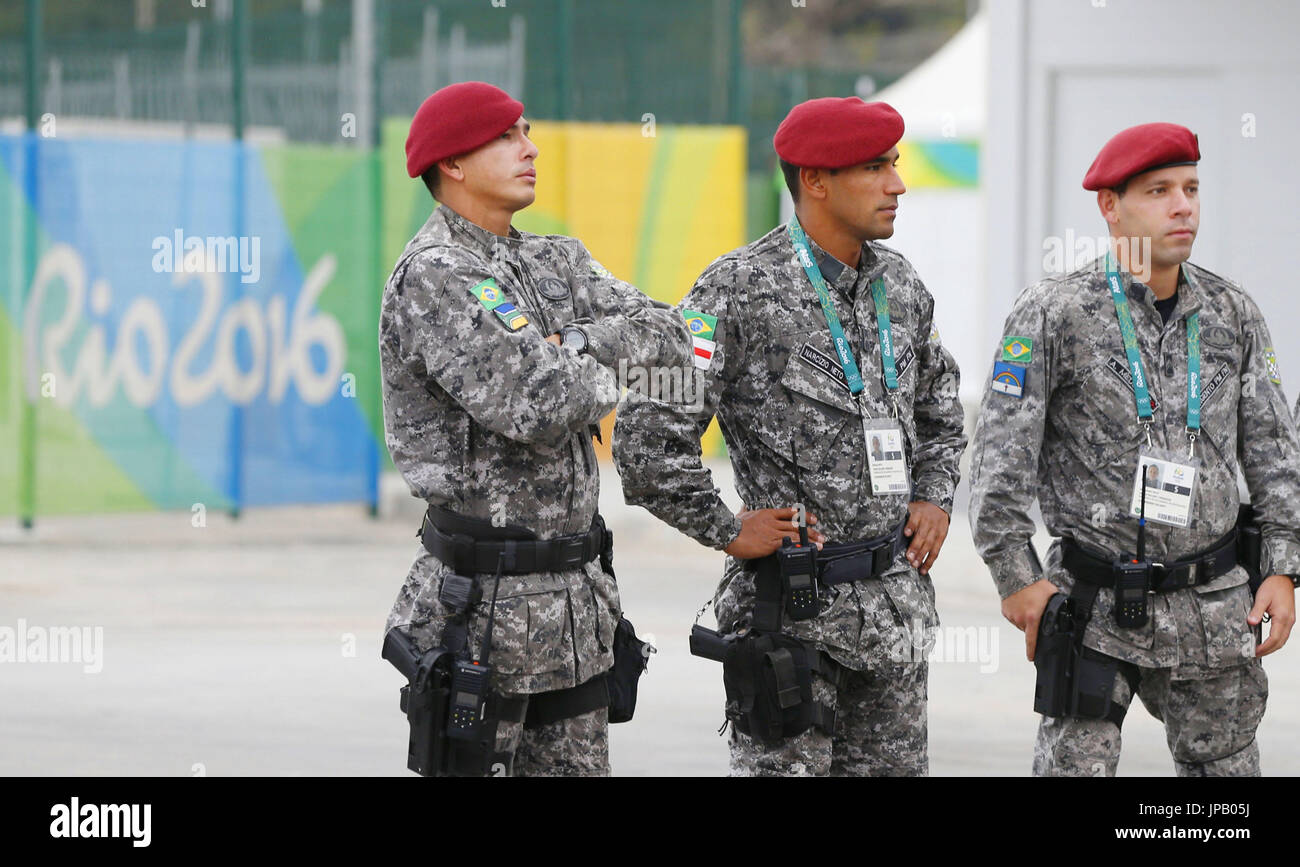 Brazilian soldiers stand guard outside the main press center for Rio de ...