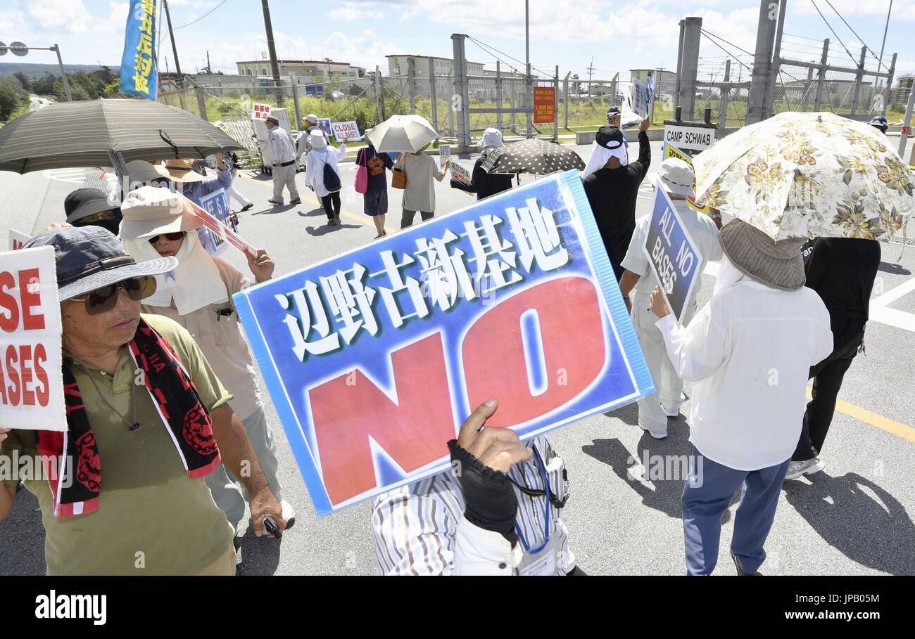 Protesters rally in front of the U.S. Marines' Camp Schwab in Nago ...