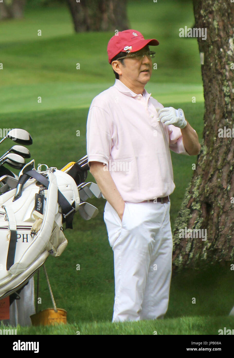 Prime Minister Shinzo Abe plays golf in the central Japan village of ...